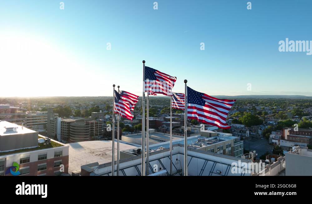 PPL Building in Allentown with American flags. Aerial view establishing ...