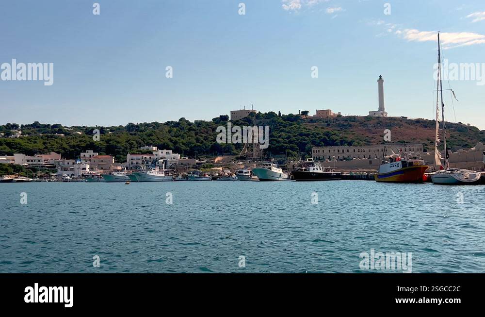 Santa Maria di Leuca city and harbor in Salento with iconic lighthouse ...