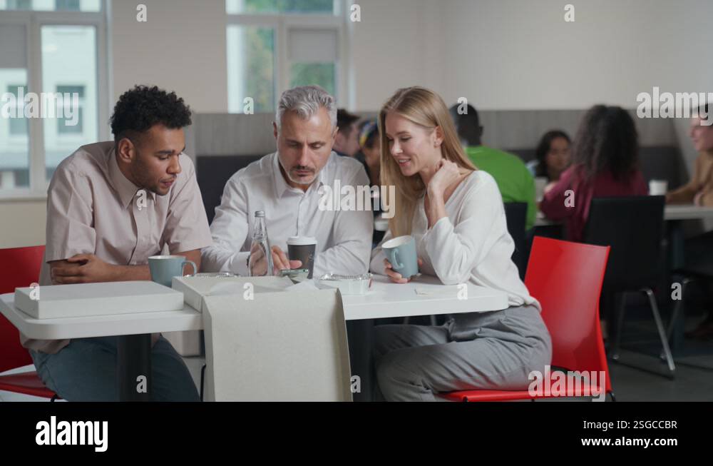 Coffee break during business meeting, international management team at ...