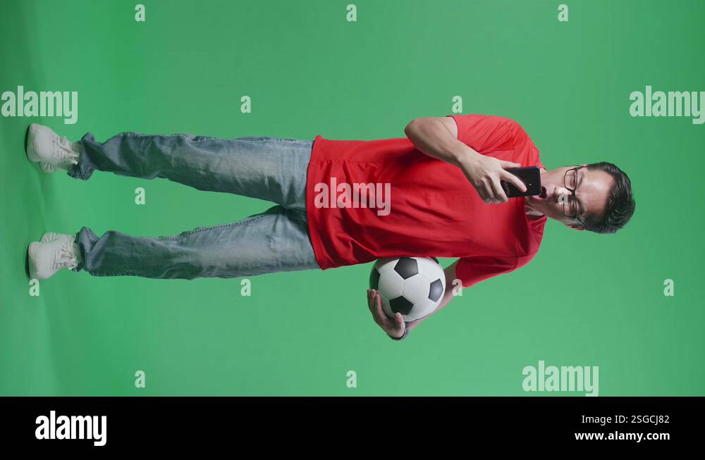 Full Body Of Asian Man With A Ball Screaming Goal Celebrating While ...