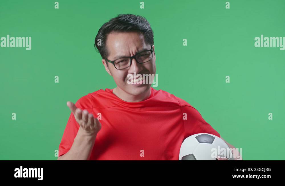 Close Up Of Asian Man With A Ball Making Fun Of The Losers While ...