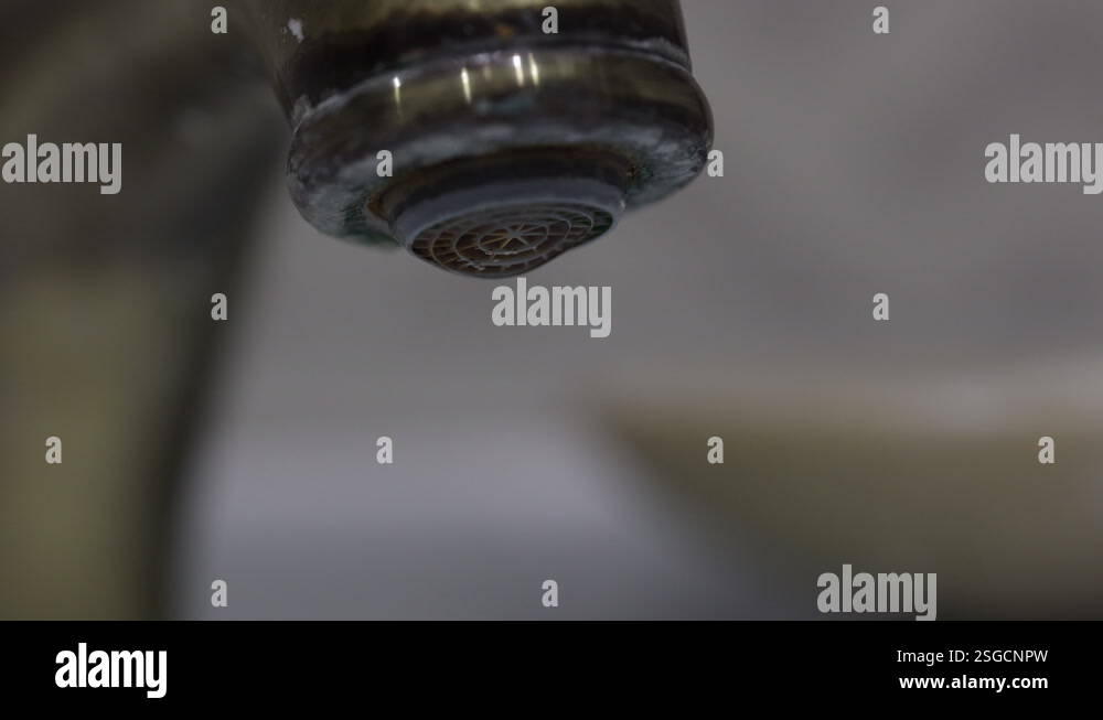 Water Dripping From Tap. Macro. Drop Of Water Drips From The Water ...
