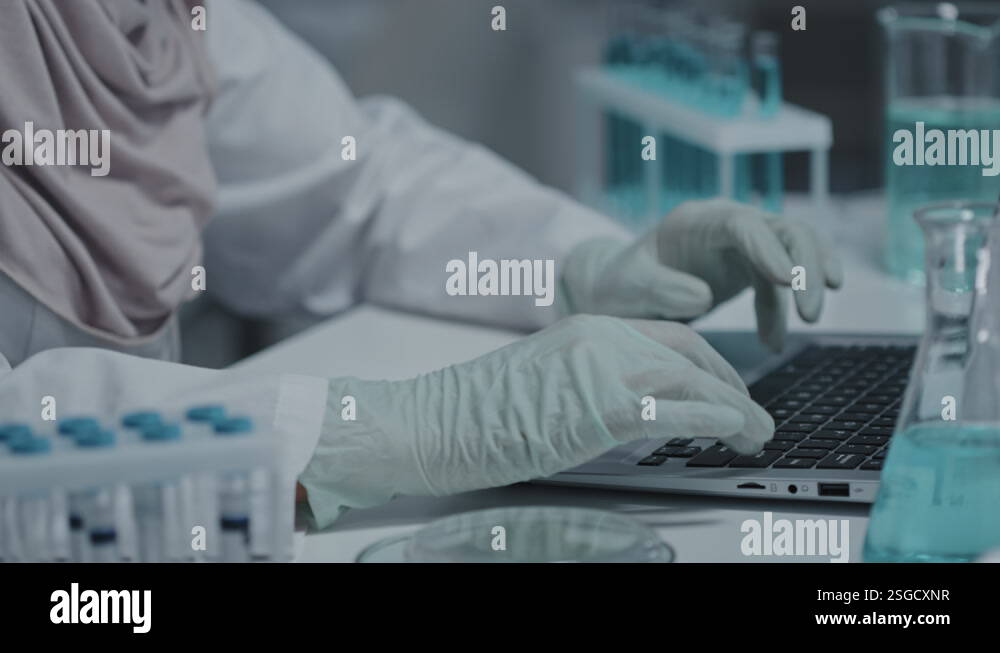 Lab Technician Typing on Keyboard Stock Video Footage - Alamy