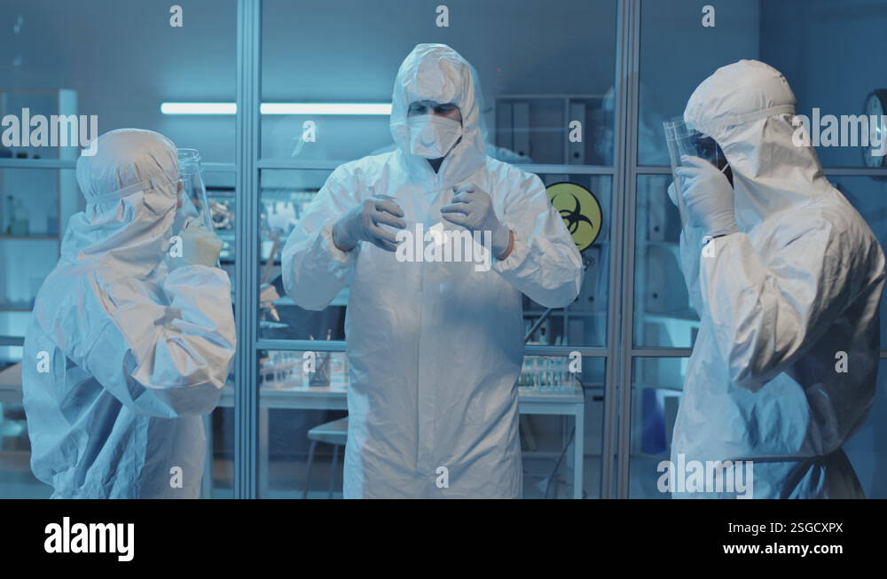 Doctors Putting on Face Shields Stock Video Footage - Alamy