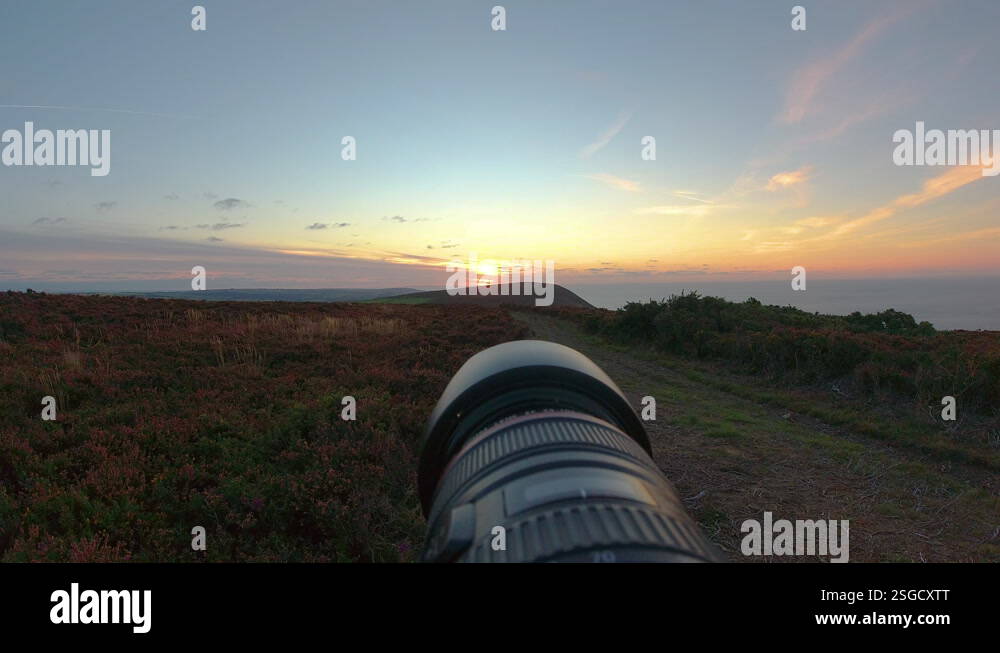 Sunset Timelapse with Camera Lens on Moorland with Dynamic Clouds and ...