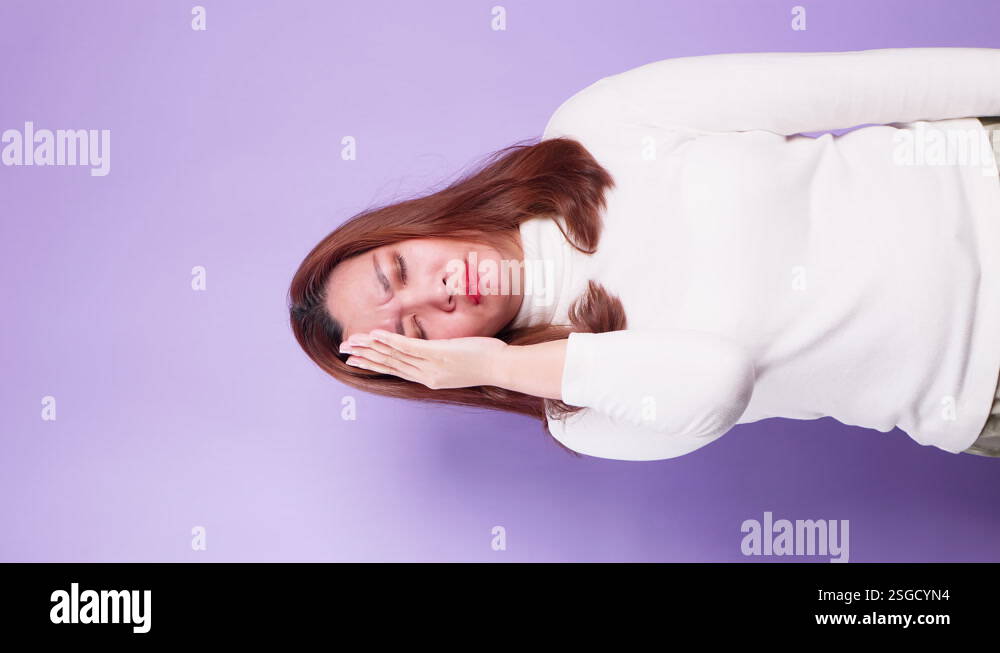 Vertical of Frustrated stressed young Asian woman coping with emotions ...