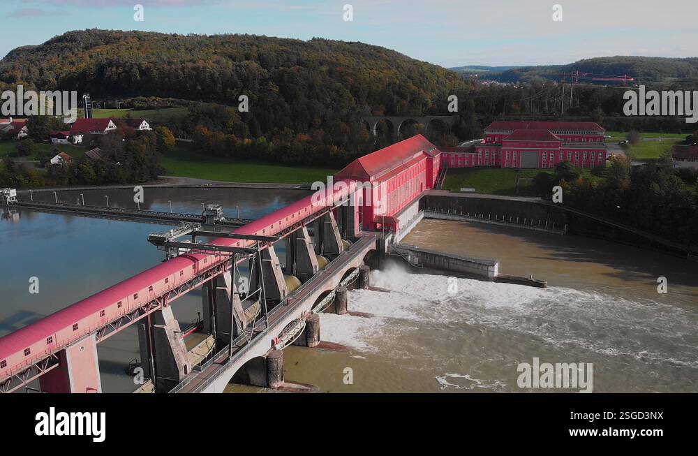 Sluice gates on Rhine river. Dam river with powerful water stream ...