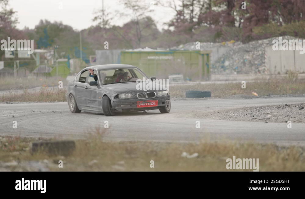 Racetrack drifting corners with old ruined BMW car in slow motion 4K ...