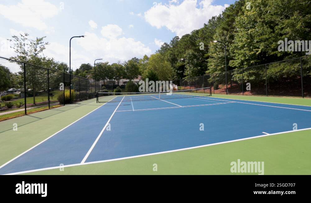 Pan Right of Tennis Court Stock Video Footage - Alamy