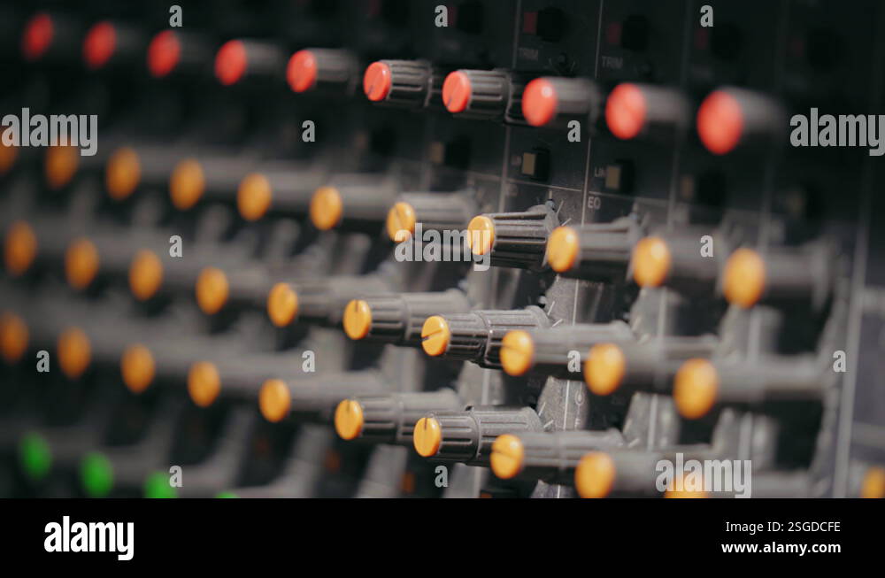 Light Shining On Control Knobs Of Mixing Console At Recording Studio ...