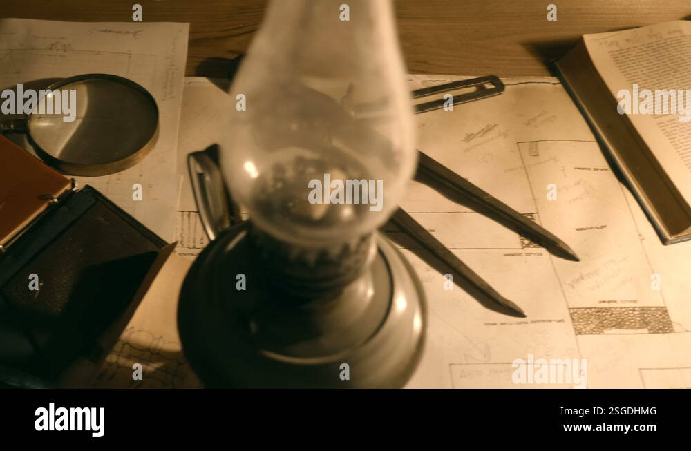 In the twilight, the table of an ancient archaeologist, explorer ...