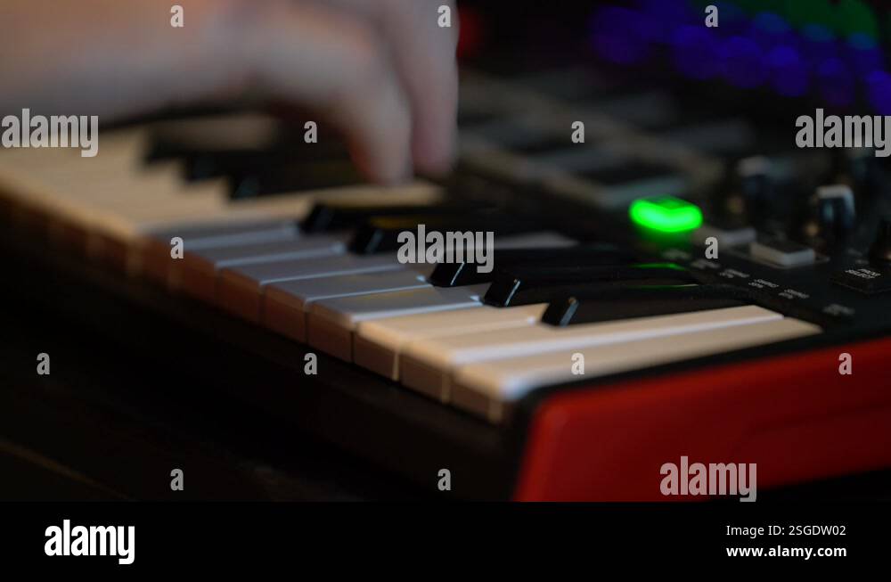 Playing piano chords on small mini MIDI controller keyboard to produce ...