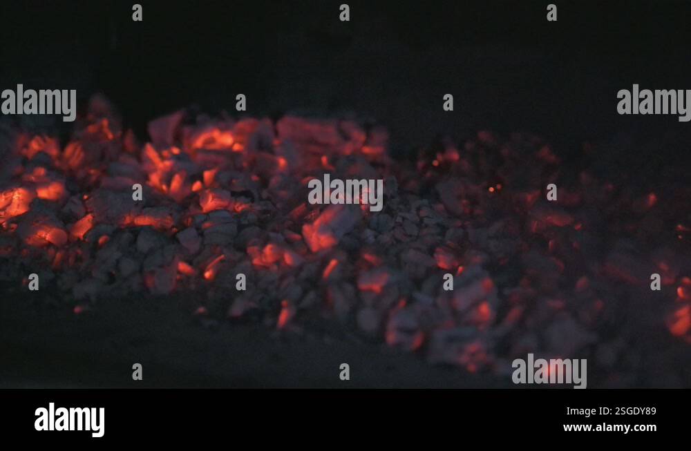 A fire burning in a stone furnace. filmed in slow motion. Only the ...