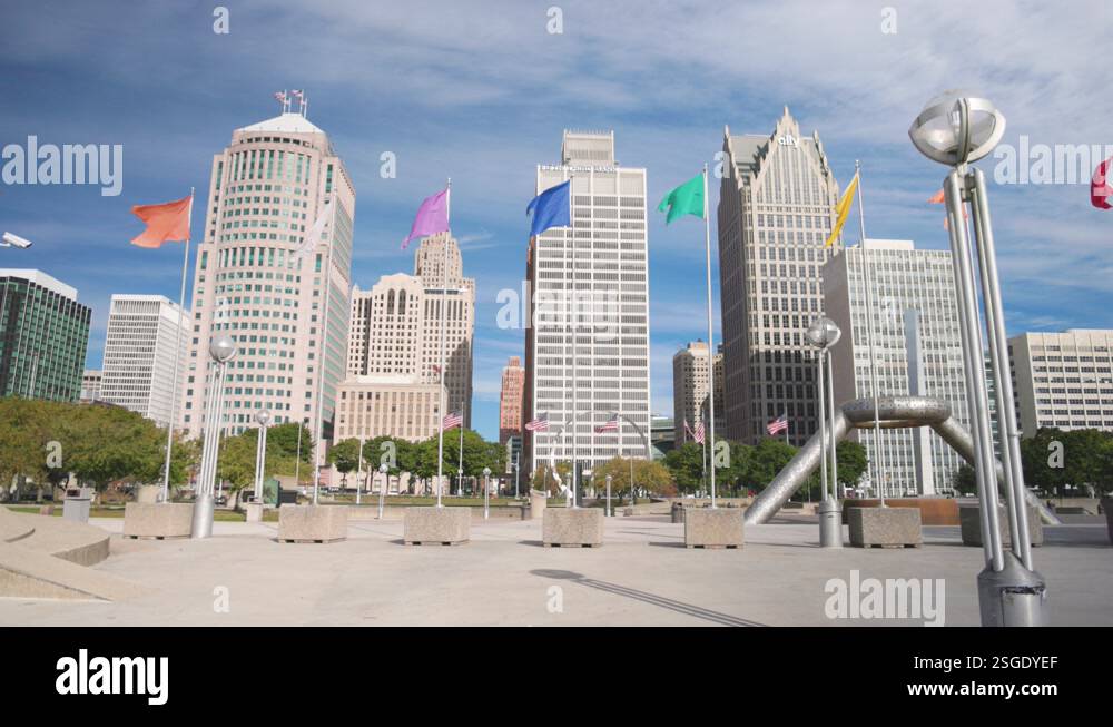 Hart Plaza in Detroit, Michigan with flags flying and gimbal video ...