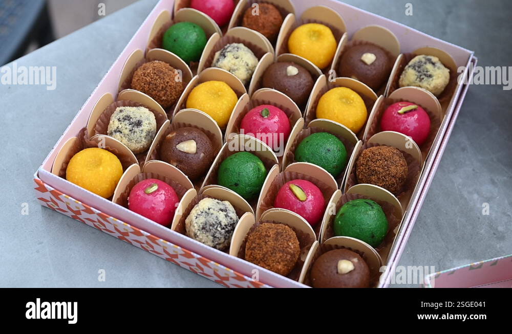 Colourful Diwali sweets pack, Indian sweet festival dish called mithai ...