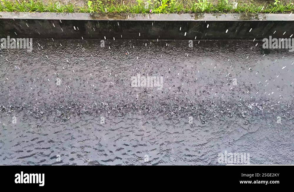 Slow Motion of Raindrops Falling into Shallow Water During Tropical ...
