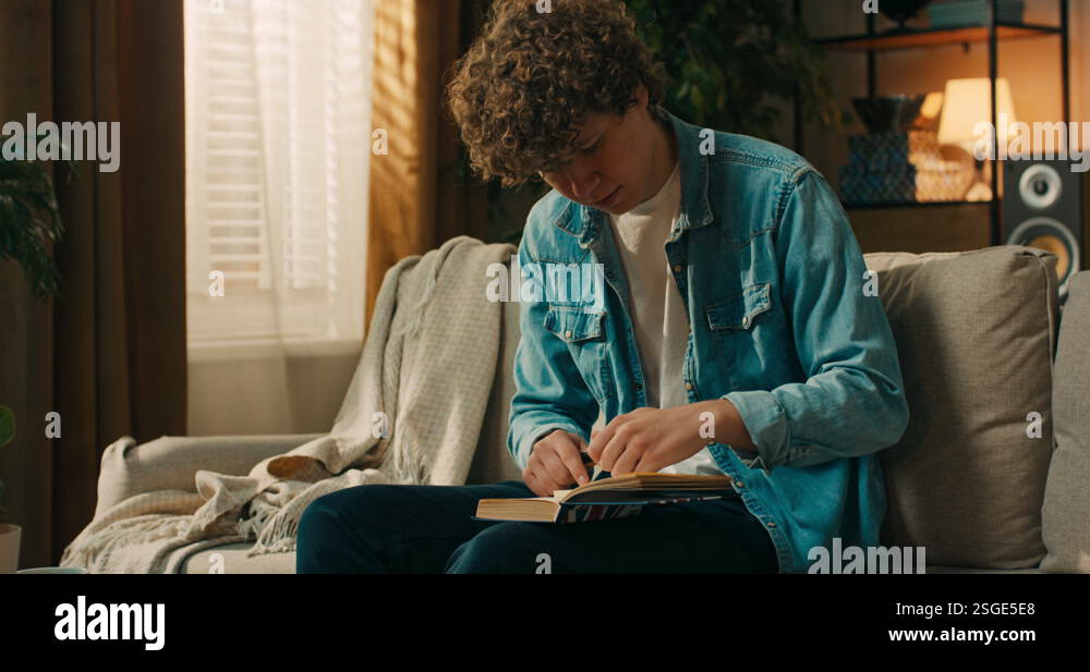 Lucky student who writes and sticks cards with English names of objects ...