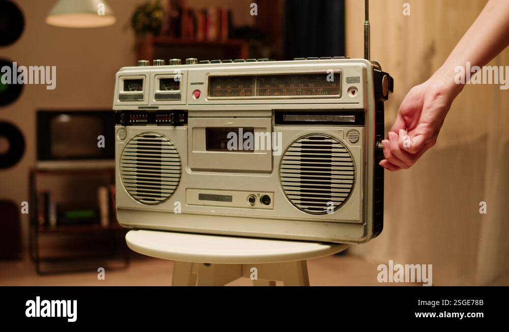 Retro radio tape recorder close-up. Listening to music, old radio ...