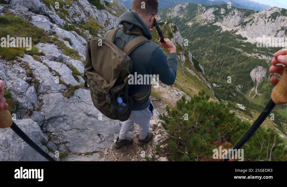 POV footage was filmed with a GoPro of a hiker hiking on top of a ...