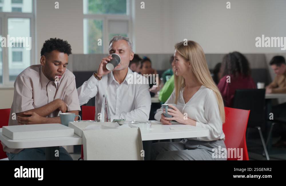 Coffee break during business meeting, international management team at ...