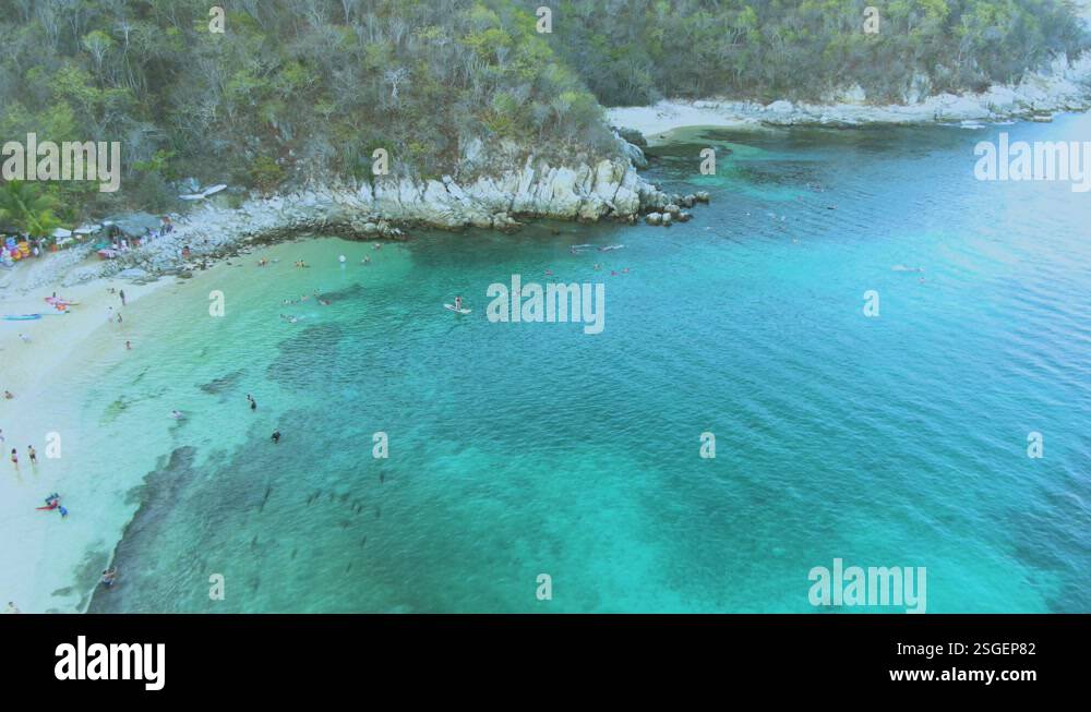 Kayaking on sunny day. Aerial elevation, birds eye, Huatulco Oaxaca ...