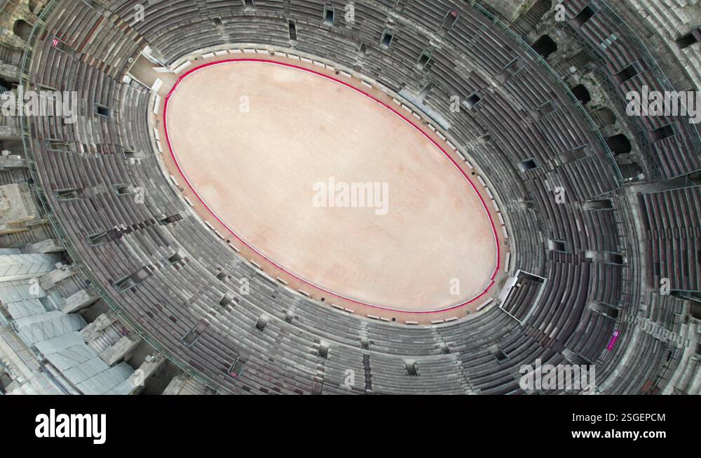 Ancient Roman Coliseum, overhead drone shot of seating and arena floor ...