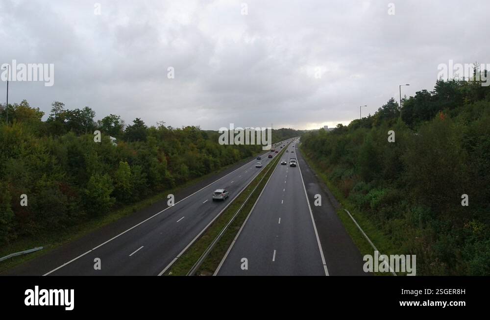 M4 Motorway Freeway with Cars and Haulage Trucks Driving in the Rain ...