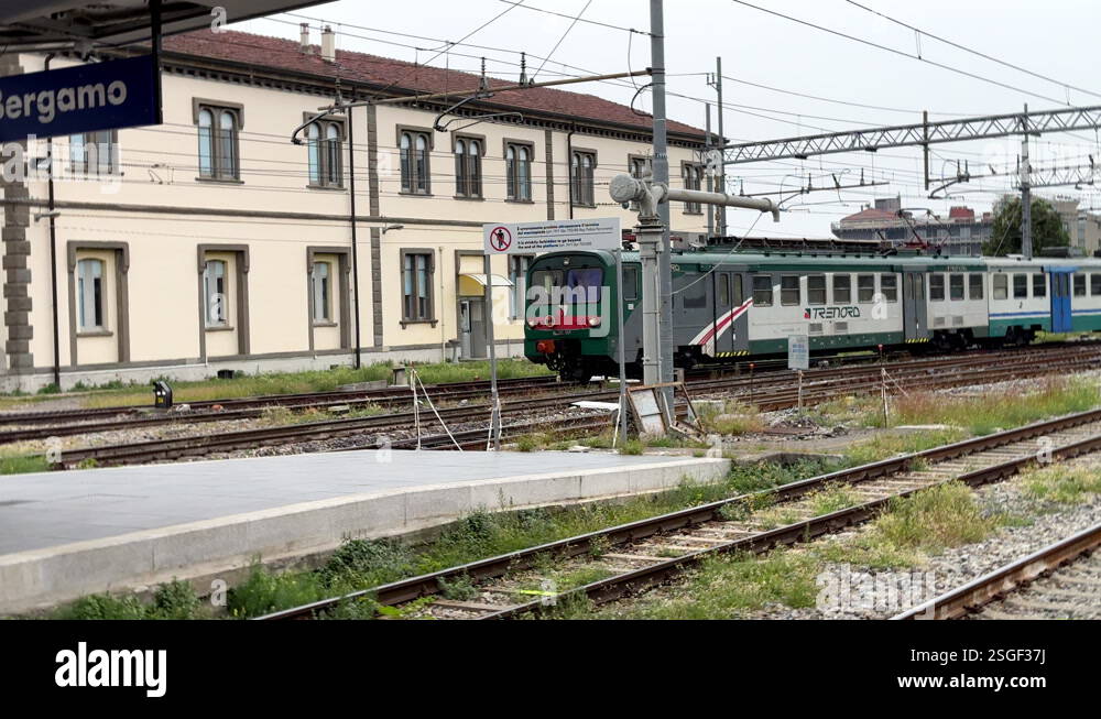 Trenord passenger railway train pulling into Bergamo station in Italy ...