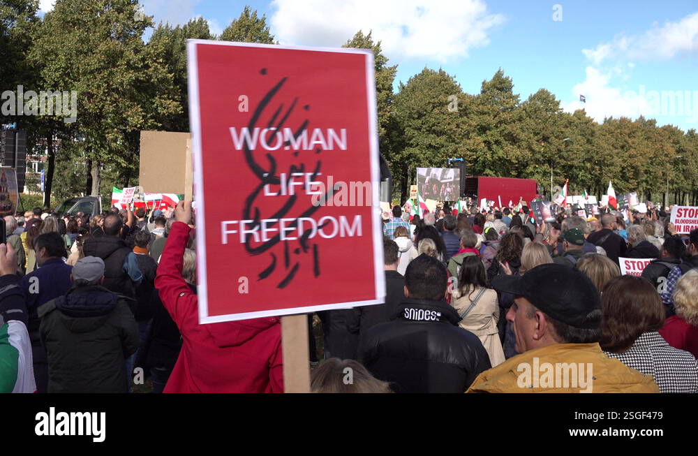 Woman life freedom sign at support rally for Iranian women, Mahsa Amini ...
