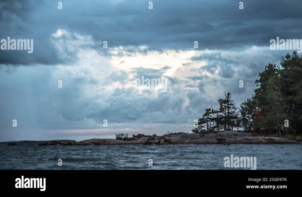 Storm coming from the ocean. Clouds moving and boats sailing Stock ...