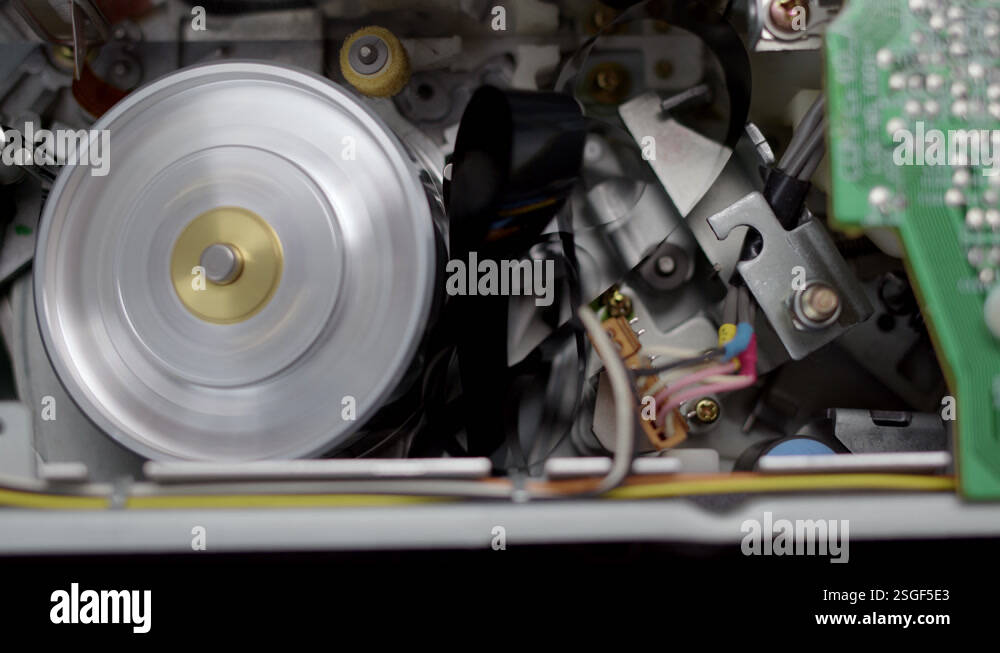 VHS cassette player jammed and chewed cassette tape VCR. broken retro ...