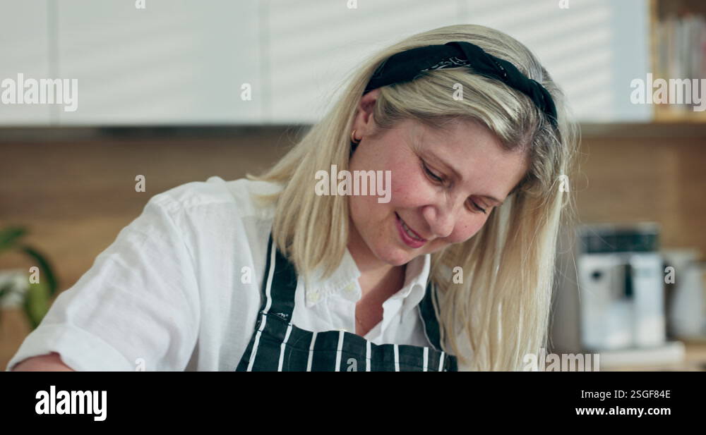 Close up shot selective focus on kneading process on wooden surface ...