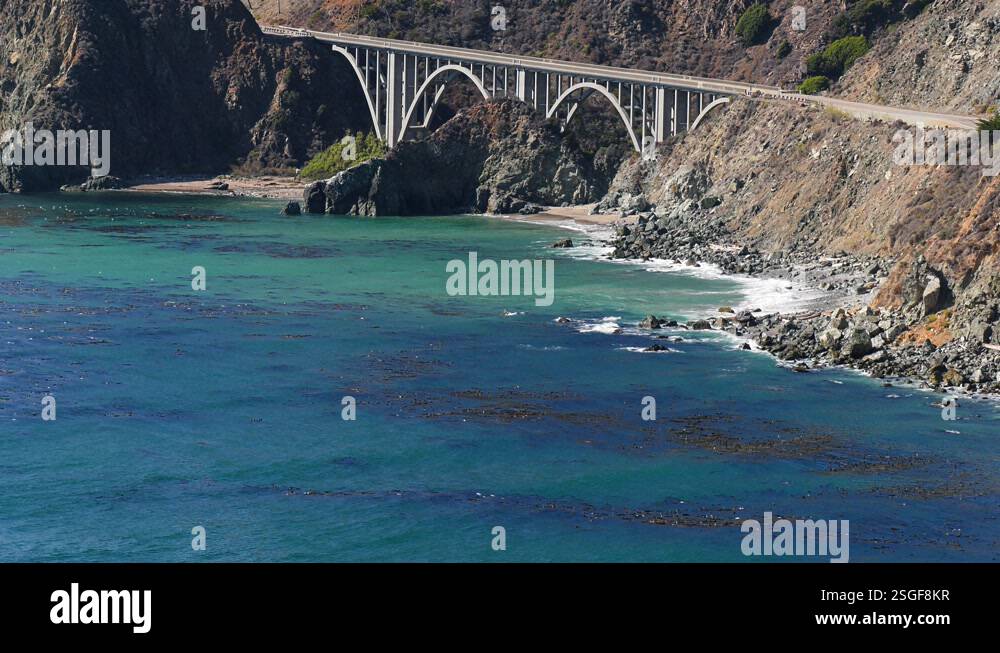 Bridge and the US Highway 1, calm, sunny day at the Big sur coastline in Stock Video Footage - Alamy