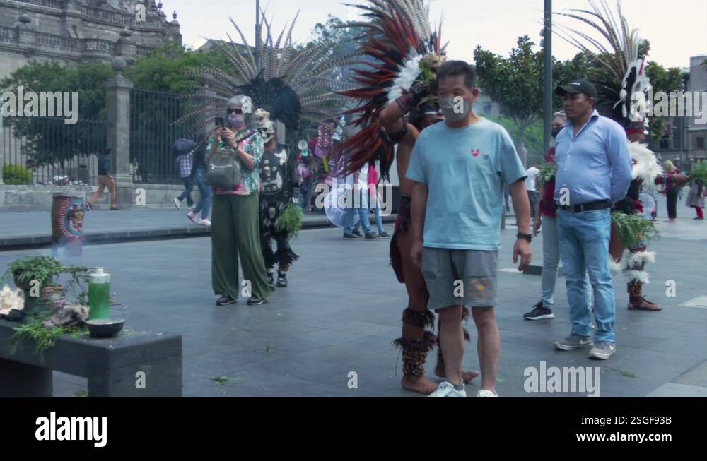 Tourist having a cleansing ritual by an Aztec shaman at Mexico's City ...