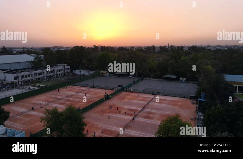 4K Drone Shots of a Sunset in an Indian City New Delhi above trees and ...