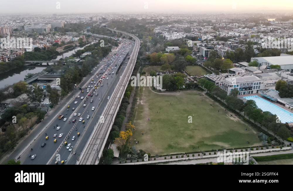 4K Drone Shots of a Sunset in an Indian City New Delhi above trees and ...