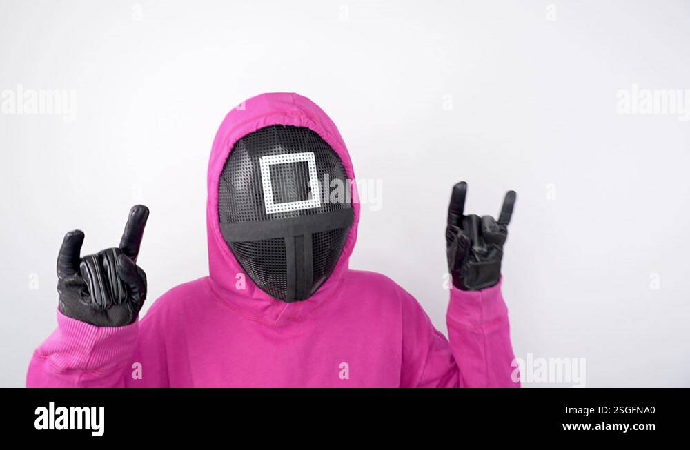 Squid Game pink guard dancing with rock sign hands up on white ...