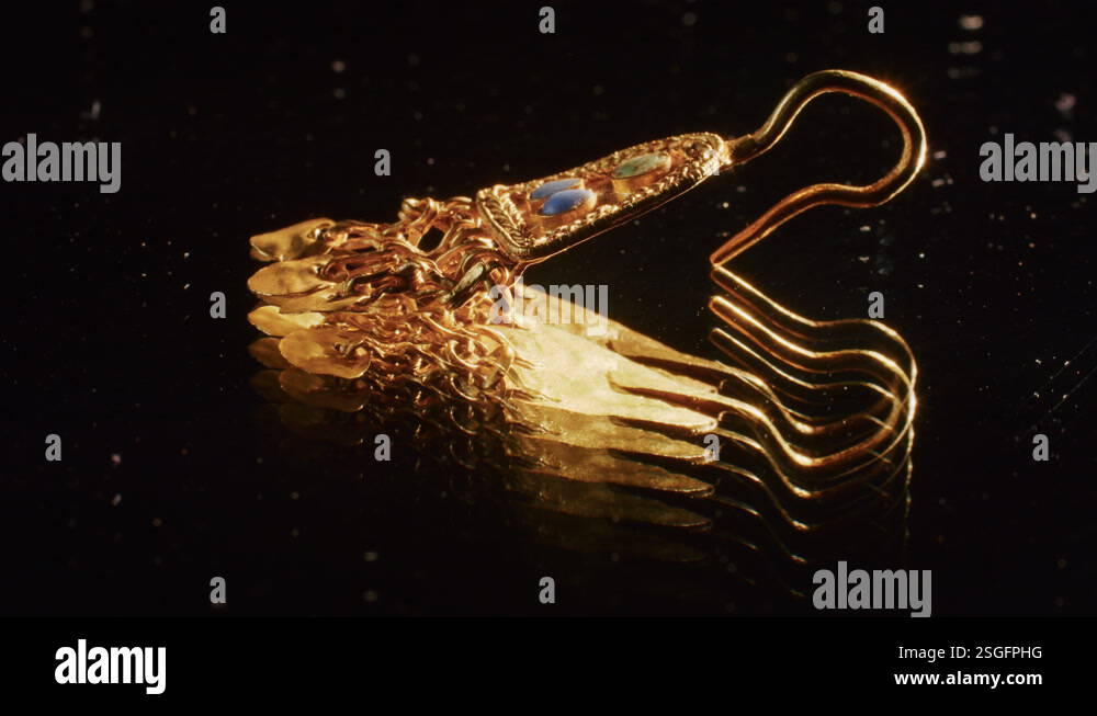 gold earring of a Scythian priestess 2000 years old, an old earring ...