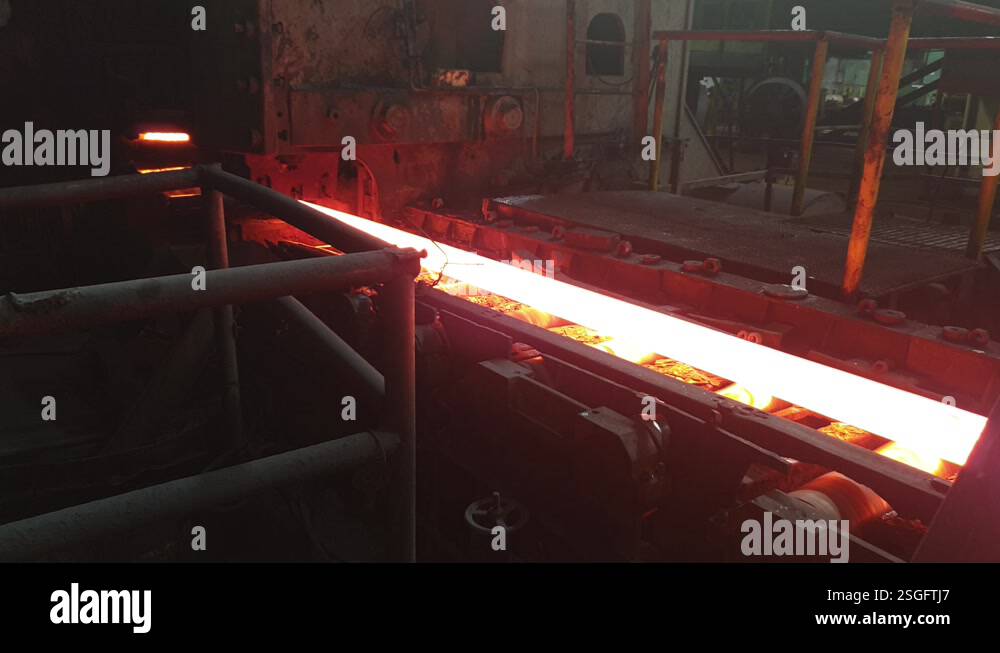 hot metal hot workpiece leaves the heating furnace on rollers. The ...