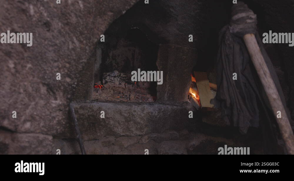 Woman Cook Fixing An Old-fashioned Oven At Chobareti Meskhetian House ...