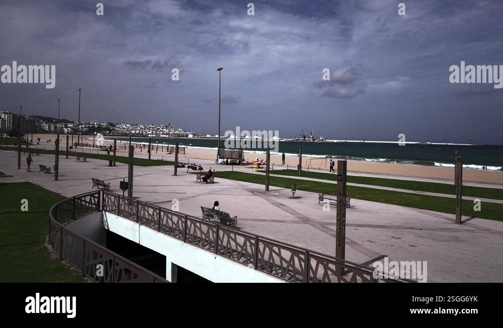 Passing via the city's beachside street. Tangier City Tour Bus Hop On ...
