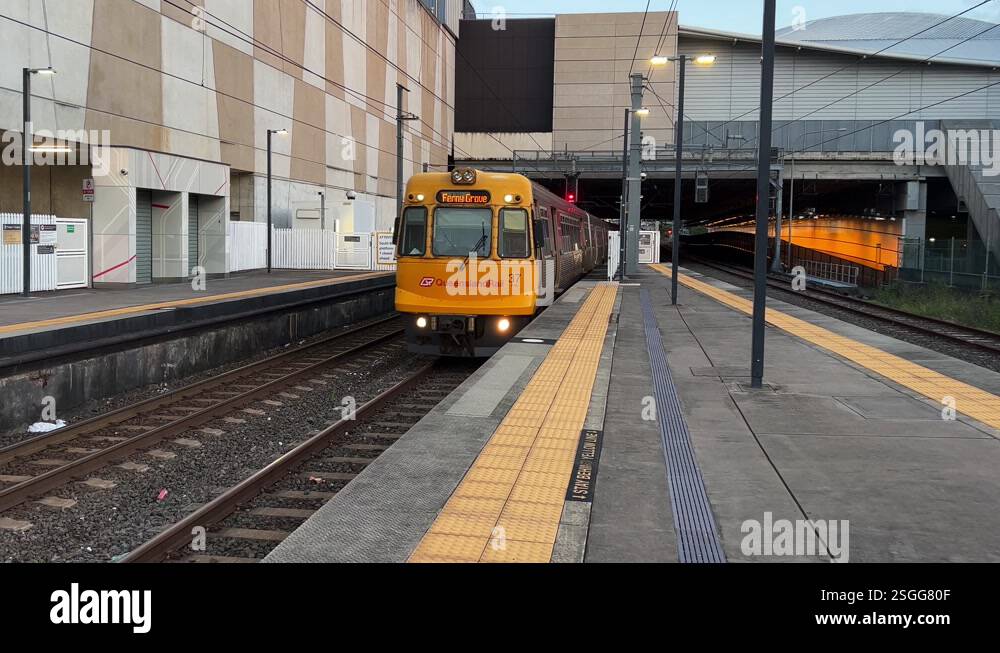 Static shot capturing incoming Ferny Grove line train arriving at the ...