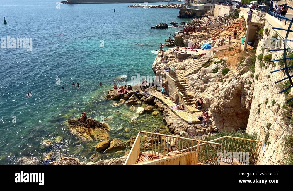 Staircase With Several Tourists On The Rocky Shore Of Coco Beach In ...