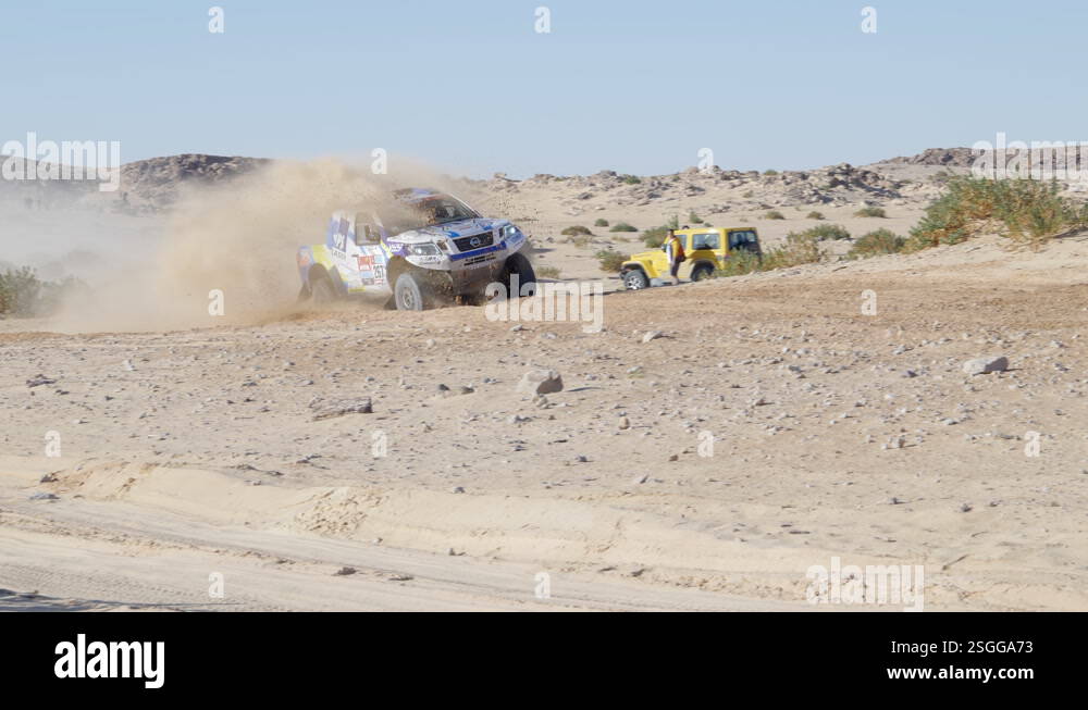 Rally Car Driving Fast On Dirt Track, Throwing Dust In The Air At Dakar ...