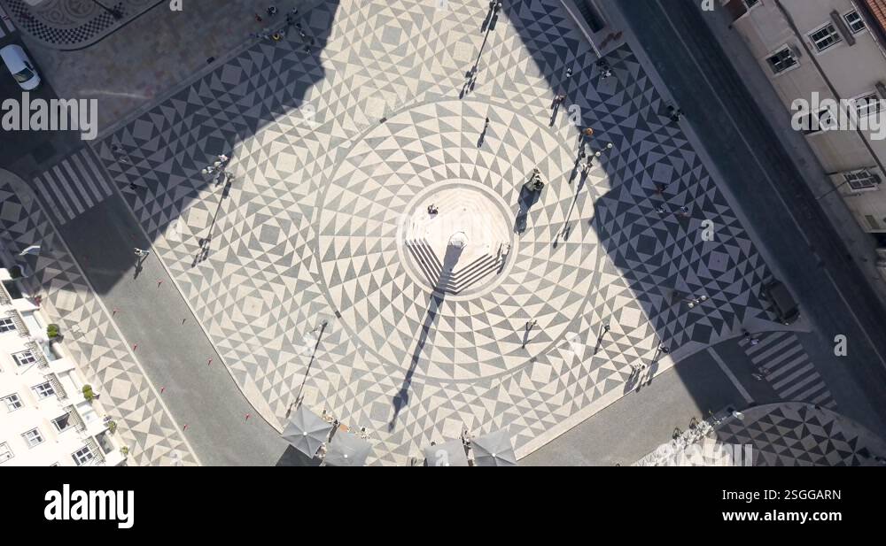 orbit drone camera flies top down over the Município do Comércio Square ...