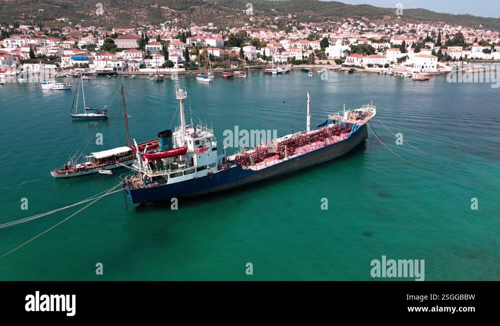 Flying orbit around a abandoned tanker freighter ship in front of the ...