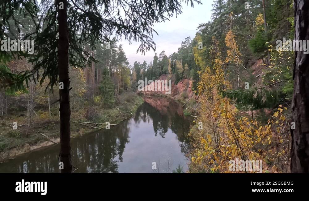 Nelku Red Sandstone Cliffs at the River Salaca in Skanaiskalns Nature ...