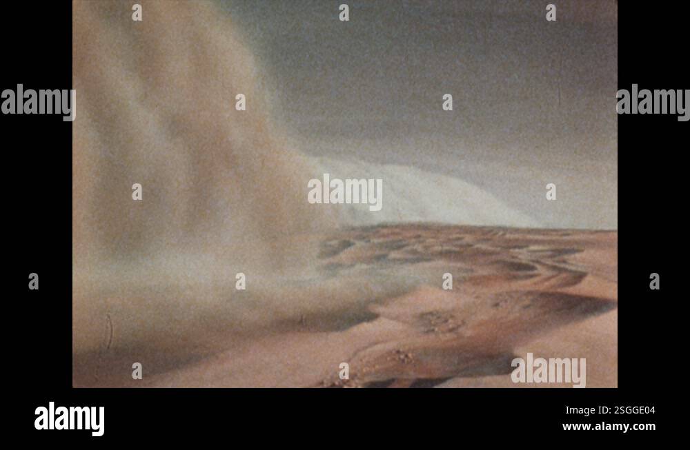 1980s: Sandstorm moving across dunes, arid desert landscape. Photograph ...
