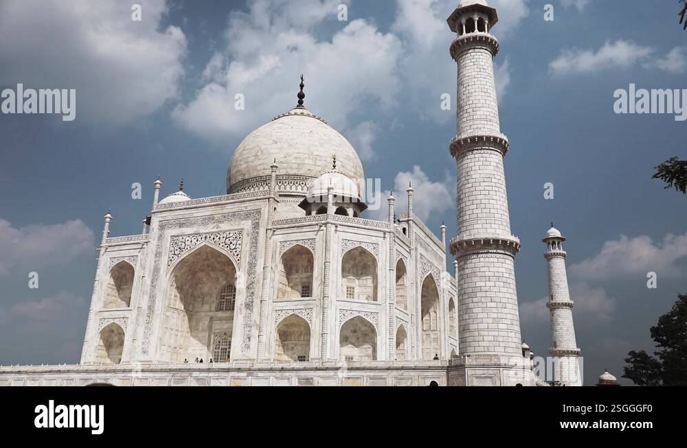 revealing Taj mahal wide pan shot with background of white clouds in ...