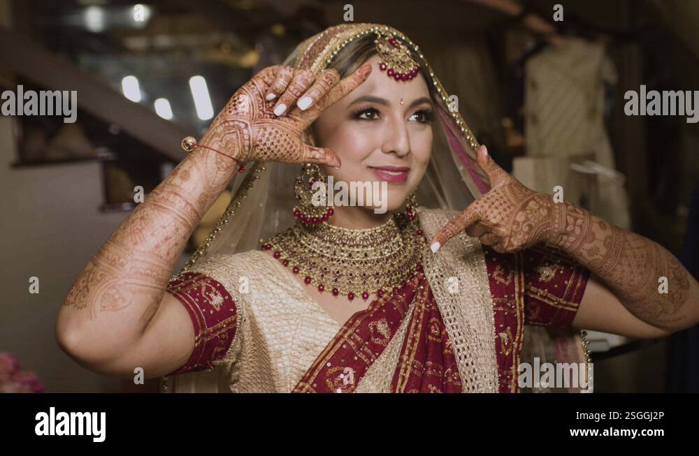 Beautiful Indian Bride Posing On Camera On The Day Of Her Wedding ...